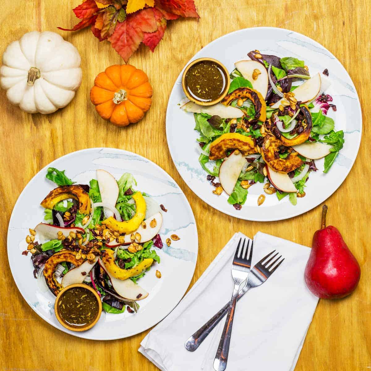 Fall salad with roasted acorn squash, pears, and maple mustard dressing